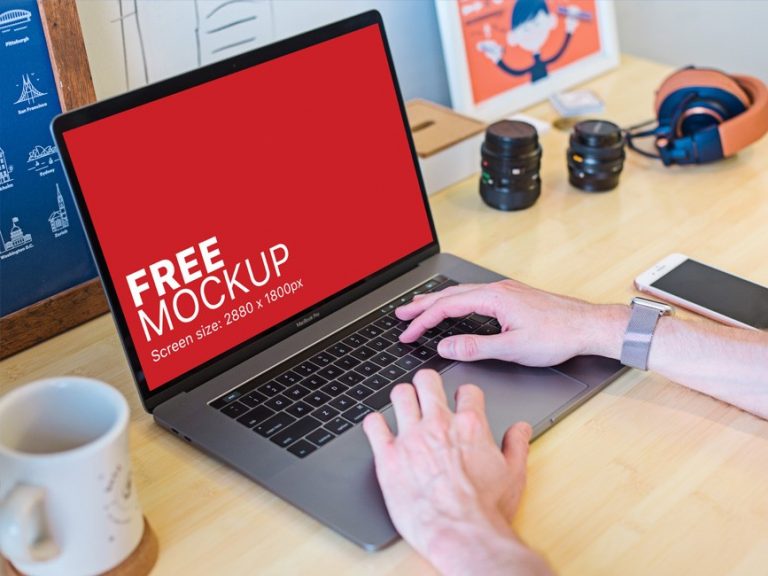 Man Working on Macbook Pro Mockup - Mockup Love