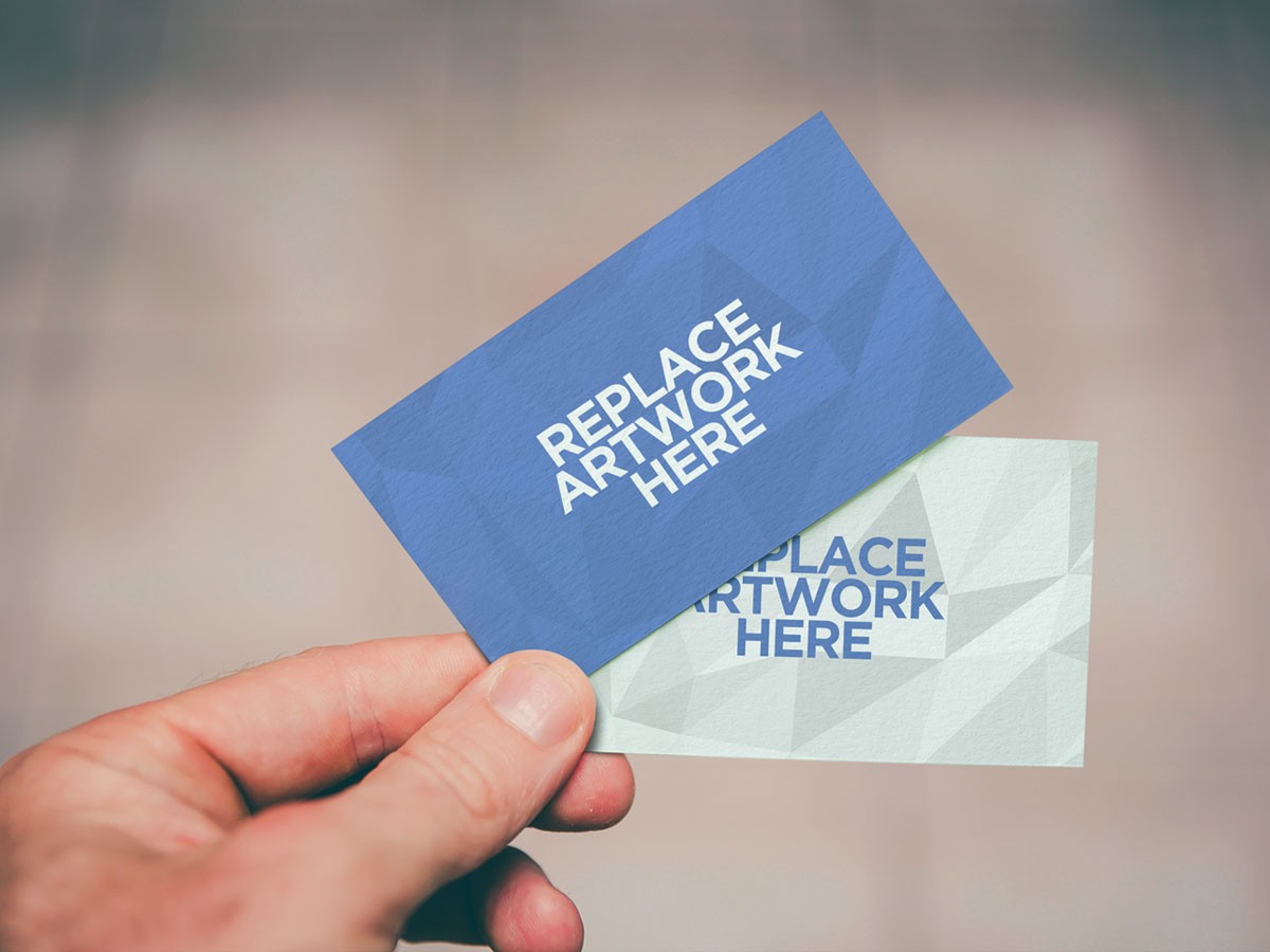 Hand Holding Business Card Mockup - Mockup Love